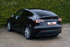 Black Tesla Model Y 2024 in Riga, with an engine capacity of 0.00 L and mileage of 24 thousand km for 43900 €, photo 8 on AUTOMOTO.COM.LV