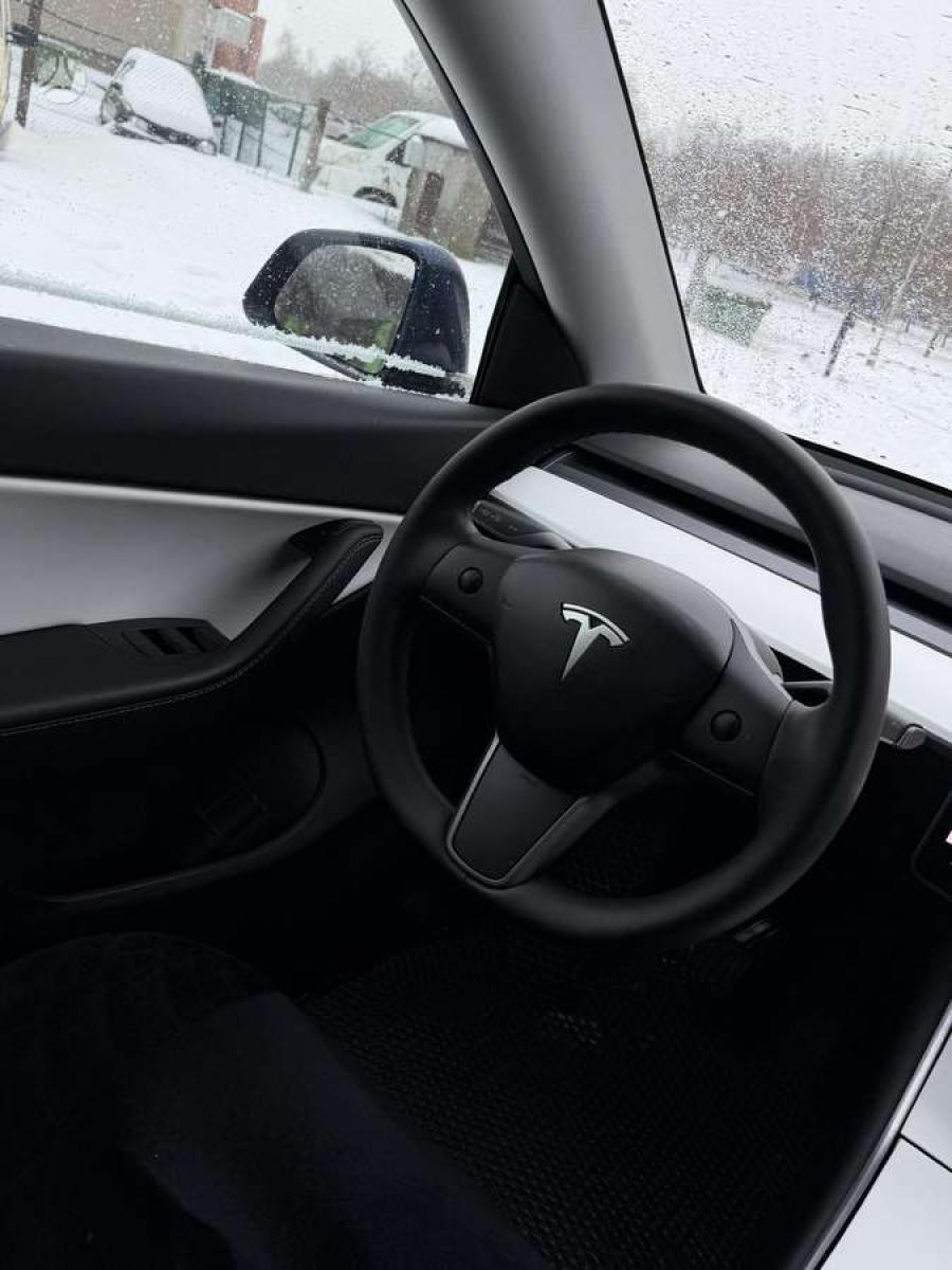 Blue Tesla Model Y 2020 in Kaunas, with an engine capacity of 0.00 L and mileage of 82 thousand km for 23000 €, photo 5 on AUTOMOTO.COM.LV