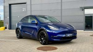 Blue Tesla Model Y 2021 in Vilnius, with an engine capacity of 0.00 L and mileage of 67 thousand km for 26990 €, photo 4 on AUTOMOTO.COM.LV