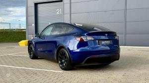 Blue Tesla Model Y 2021 in Vilnius, with an engine capacity of 0.00 L and mileage of 67 thousand km for 26990 €, photo 5 on AUTOMOTO.COM.LV