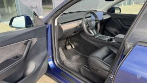 Blue Tesla Model Y 2021 in Vilnius, with an engine capacity of 0.00 L and mileage of 67 thousand km for 26990 €, photo 12 on AUTOMOTO.COM.LV