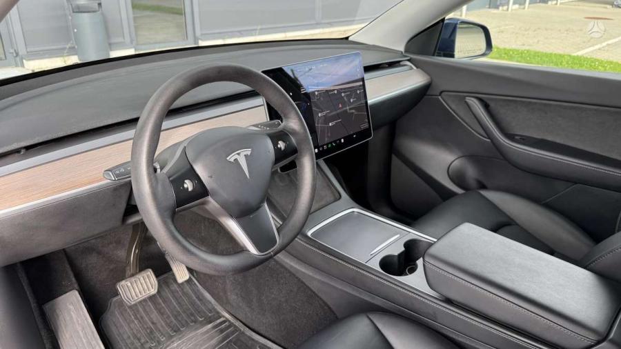 Blue Tesla Model Y 2021 in Vilnius, with an engine capacity of 0.00 L and mileage of 67 thousand km for 26990 €, photo 13 on AUTOMOTO.COM.LV