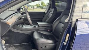 Blue Tesla Model Y 2021 in Vilnius, with an engine capacity of 0.00 L and mileage of 67 thousand km for 26990 €, photo 15 on AUTOMOTO.COM.LV