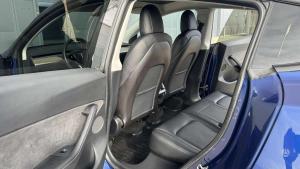 Blue Tesla Model Y 2021 in Vilnius, with an engine capacity of 0.00 L and mileage of 67 thousand km for 26990 €, photo 16 on AUTOMOTO.COM.LV