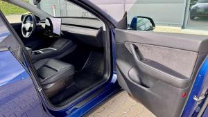 Blue Tesla Model Y 2021 in Vilnius, with an engine capacity of 0.00 L and mileage of 67 thousand km for 26990 €, photo 18 on AUTOMOTO.COM.LV