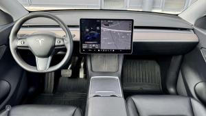 Blue Tesla Model Y 2021 in Vilnius, with an engine capacity of 0.00 L and mileage of 67 thousand km for 26990 €, photo 20 on AUTOMOTO.COM.LV