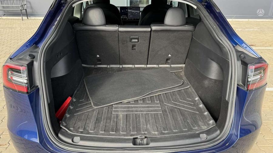 Blue Tesla Model Y 2021 in Vilnius, with an engine capacity of 0.00 L and mileage of 67 thousand km for 26990 €, photo 22 on AUTOMOTO.COM.LV