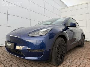 Blue Tesla Model Y 2022 in Riga, with an engine capacity of 0.00 L and mileage of 123 thousand km for 28900 €, photo 3 on AUTOMOTO.COM.LV