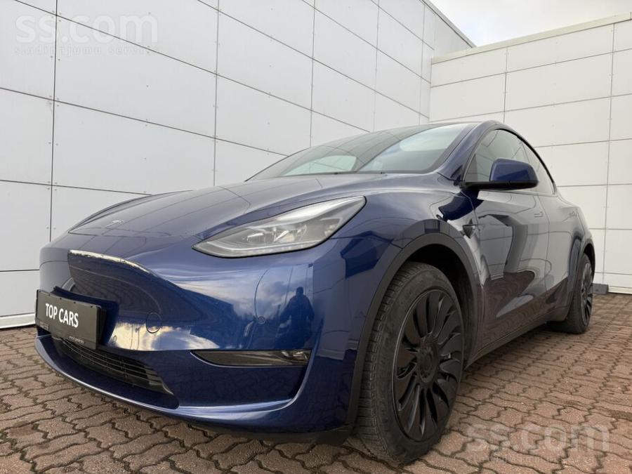 Blue Tesla Model Y 2022 in Riga, with an engine capacity of 0.00 L and mileage of 123 thousand km for 28900 €, photo 3 on AUTOMOTO.COM.LV
