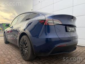 Blue Tesla Model Y 2022 in Riga, with an engine capacity of 0.00 L and mileage of 123 thousand km for 28900 €, photo 4 on AUTOMOTO.COM.LV