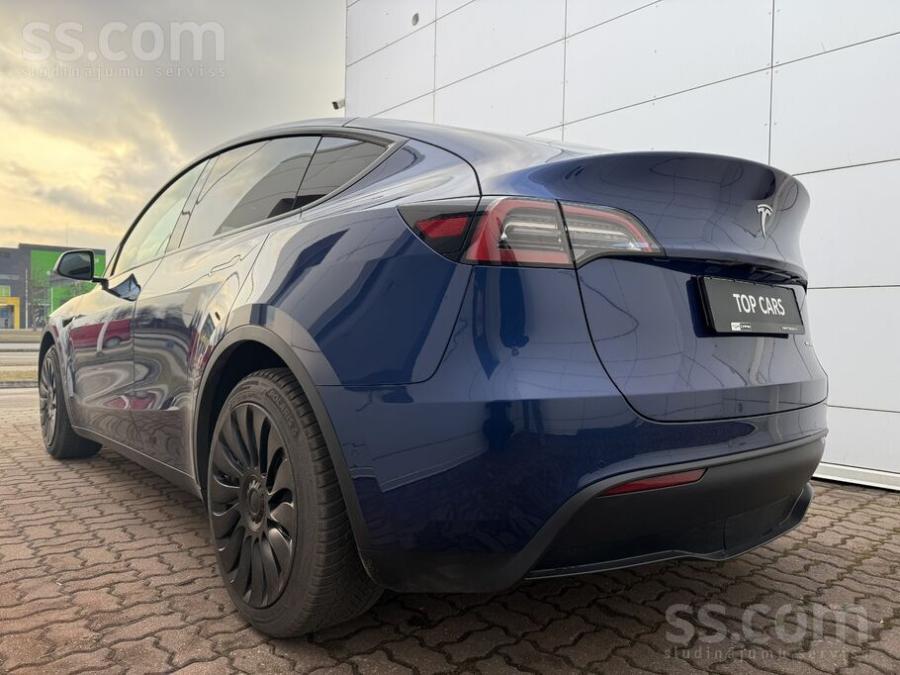 Blue Tesla Model Y 2022 in Riga, with an engine capacity of 0.00 L and mileage of 123 thousand km for 28900 €, photo 4 on AUTOMOTO.COM.LV
