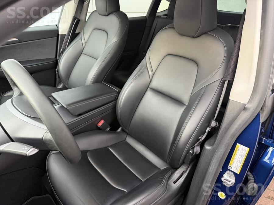 Blue Tesla Model Y 2022 in Riga, with an engine capacity of 0.00 L and mileage of 123 thousand km for 28900 €, photo 8 on AUTOMOTO.COM.LV