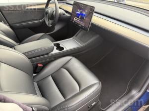 Blue Tesla Model Y 2022 in Riga, with an engine capacity of 0.00 L and mileage of 123 thousand km for 28900 €, photo 9 on AUTOMOTO.COM.LV