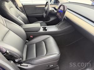 Blue Tesla Model Y 2022 in Riga, with an engine capacity of 0.00 L and mileage of 123 thousand km for 28900 €, photo 10 on AUTOMOTO.COM.LV
