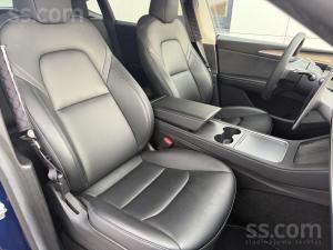 Blue Tesla Model Y 2022 in Riga, with an engine capacity of 0.00 L and mileage of 123 thousand km for 28900 €, photo 11 on AUTOMOTO.COM.LV