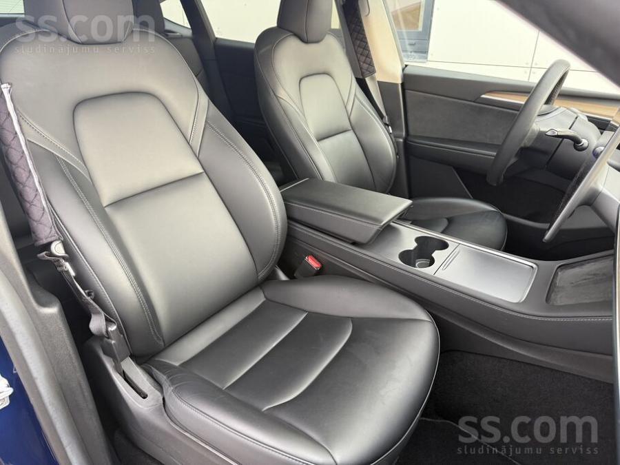 Blue Tesla Model Y 2022 in Riga, with an engine capacity of 0.00 L and mileage of 123 thousand km for 28900 €, photo 11 on AUTOMOTO.COM.LV