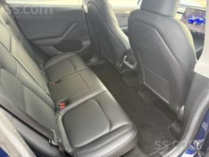 Blue Tesla Model Y 2022 in Riga, with an engine capacity of 0.00 L and mileage of 123 thousand km for 28900 €, photo 12 on AUTOMOTO.COM.LV