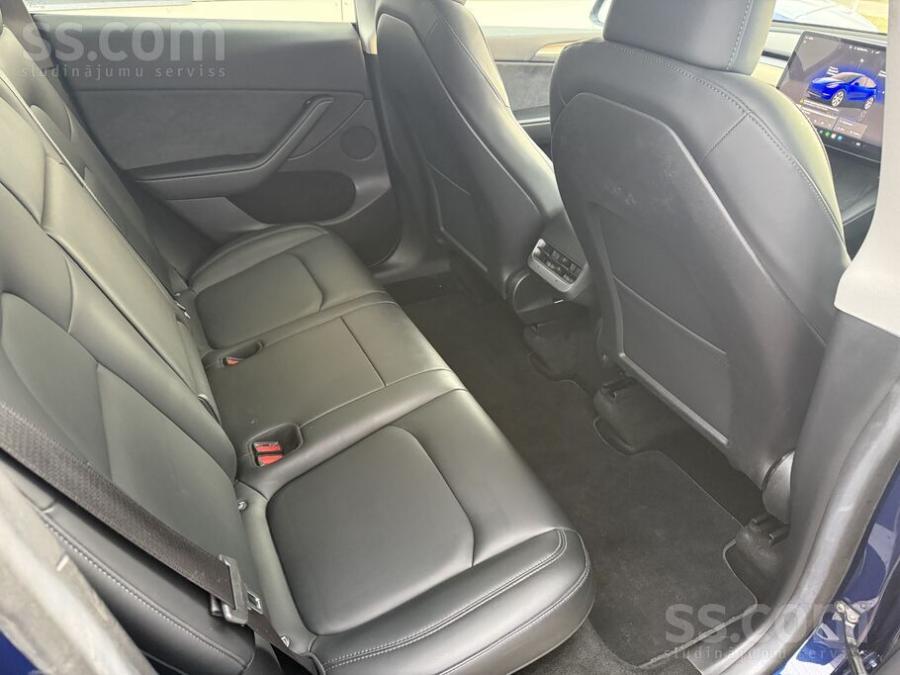 Blue Tesla Model Y 2022 in Riga, with an engine capacity of 0.00 L and mileage of 123 thousand km for 28900 €, photo 12 on AUTOMOTO.COM.LV