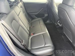 Blue Tesla Model Y 2022 in Riga, with an engine capacity of 0.00 L and mileage of 123 thousand km for 28900 €, photo 13 on AUTOMOTO.COM.LV
