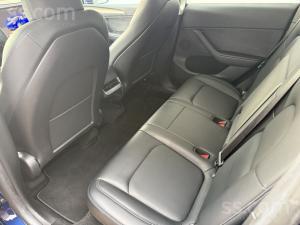 Blue Tesla Model Y 2022 in Riga, with an engine capacity of 0.00 L and mileage of 123 thousand km for 28900 €, photo 14 on AUTOMOTO.COM.LV