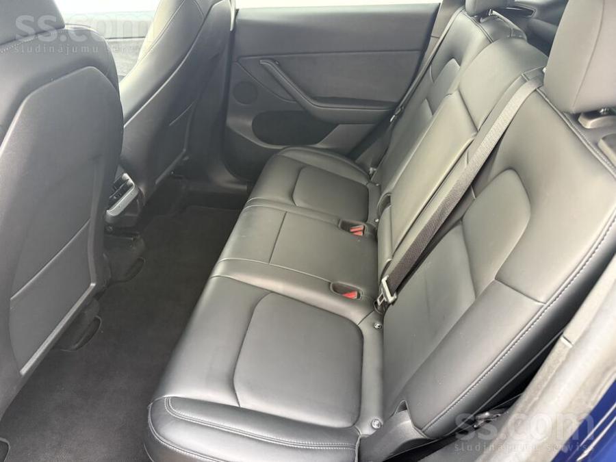 Blue Tesla Model Y 2022 in Riga, with an engine capacity of 0.00 L and mileage of 123 thousand km for 28900 €, photo 15 on AUTOMOTO.COM.LV