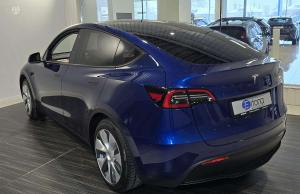 Blue Tesla Model Y 2023 in Siauliai, with an engine capacity of 0.00 L and mileage of 34 thousand km for 26900 €, photo 3 on AUTOMOTO.COM.LV