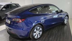 Blue Tesla Model Y 2023 in Siauliai, with an engine capacity of 0.00 L and mileage of 34 thousand km for 26900 €, photo 6 on AUTOMOTO.COM.LV