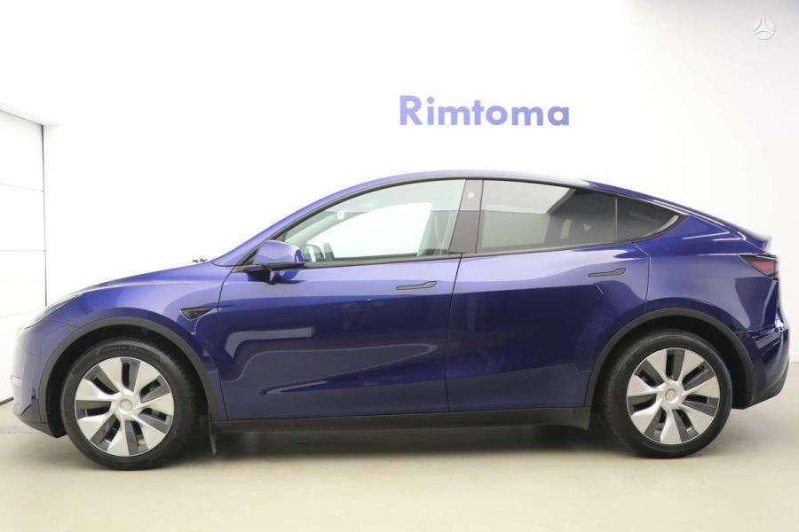Blue Tesla Model Y 2023 in Vilnius, with an engine capacity of 0.00 L and mileage of 105 thousand km for 33900 €, photo 4 on AUTOMOTO.COM.LV