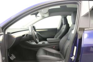Blue Tesla Model Y 2023 in Vilnius, with an engine capacity of 0.00 L and mileage of 105 thousand km for 33900 €, photo 14 on AUTOMOTO.COM.LV