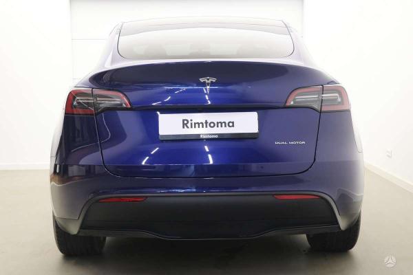 Blue Tesla Model Y 2023 in Vilnius, with an engine capacity of 0.00 L and mileage of 105 thousand km for 33490 €, photo 6 on AUTOMOTO.COM.LV