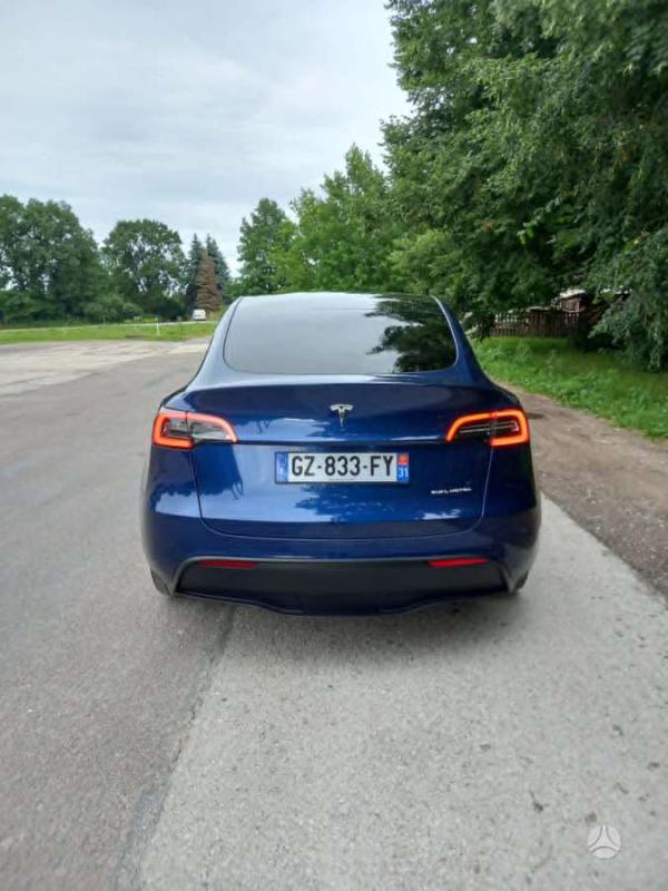 Blue Tesla Model Y 2024 in Tartu, with an engine capacity of 0.00 L and mileage of 69 thousand km for 39200 €, photo 2 on AUTOMOTO.COM.LV