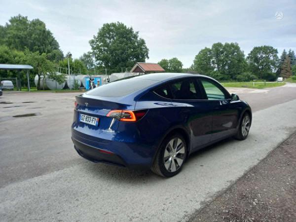 Blue Tesla Model Y 2024 in Tartu, with an engine capacity of 0.00 L and mileage of 69 thousand km for 39200 €, photo 3 on AUTOMOTO.COM.LV
