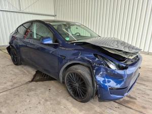 Blue Tesla Model Y 2024 in Tallinn, with an engine capacity of 0.00 L and mileage of 52 thousand km for 23500 €, photo 3 on AUTOMOTO.COM.LV