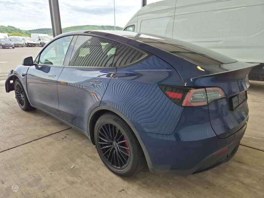 Blue Tesla Model Y 2024 in Tallinn, with an engine capacity of 0.00 L and mileage of 52 thousand km for 23500 €, photo 4 on AUTOMOTO.COM.LV
