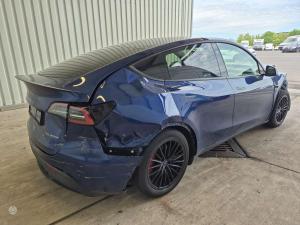 Blue Tesla Model Y 2024 in Tallinn, with an engine capacity of 0.00 L and mileage of 52 thousand km for 23500 €, photo 5 on AUTOMOTO.COM.LV