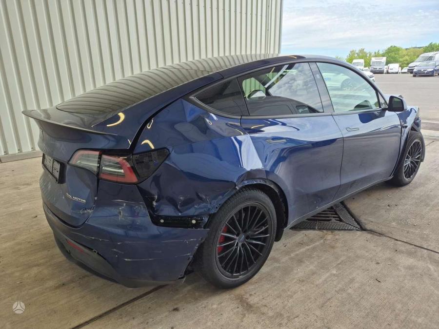 Blue Tesla Model Y 2024 in Tallinn, with an engine capacity of 0.00 L and mileage of 52 thousand km for 23500 €, photo 5 on AUTOMOTO.COM.LV