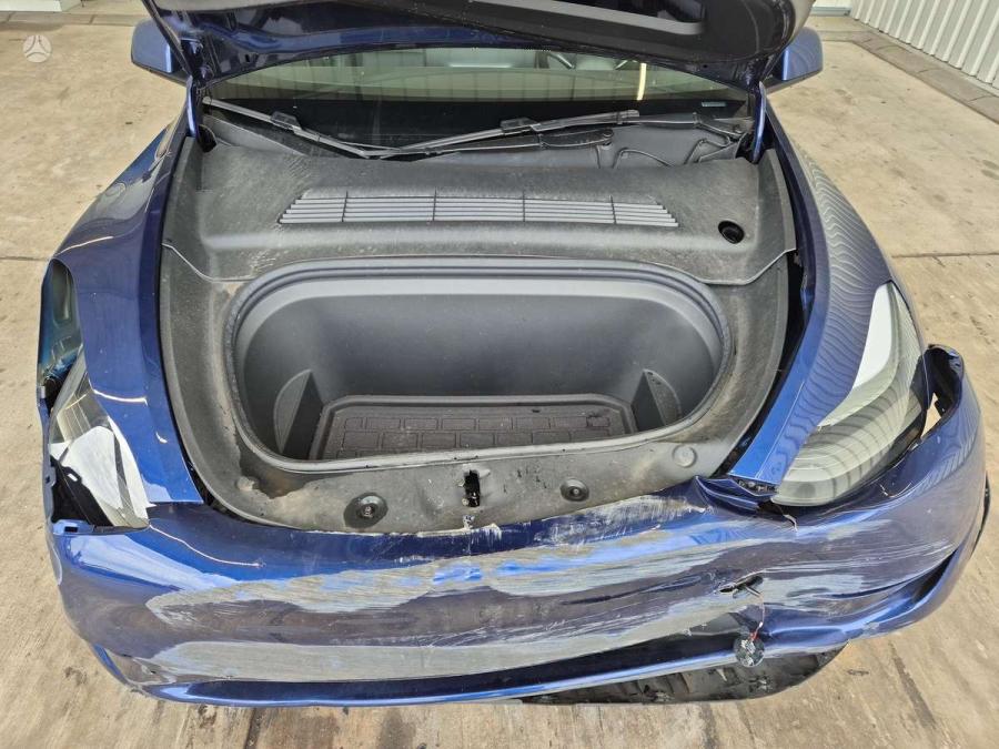 Blue Tesla Model Y 2024 in Tallinn, with an engine capacity of 0.00 L and mileage of 52 thousand km for 23500 €, photo 6 on AUTOMOTO.COM.LV