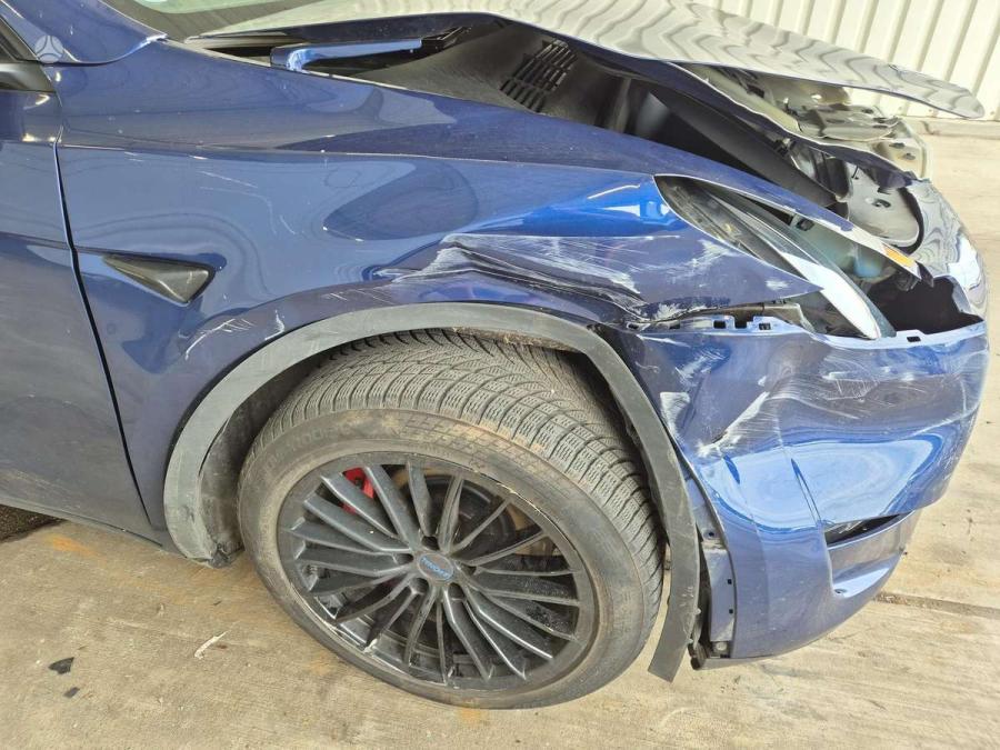 Blue Tesla Model Y 2024 in Tallinn, with an engine capacity of 0.00 L and mileage of 52 thousand km for 23500 €, photo 9 on AUTOMOTO.COM.LV