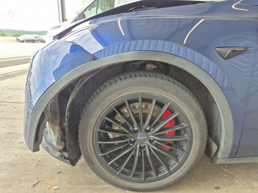 Blue Tesla Model Y 2024 in Tallinn, with an engine capacity of 0.00 L and mileage of 52 thousand km for 23500 €, photo 11 on AUTOMOTO.COM.LV