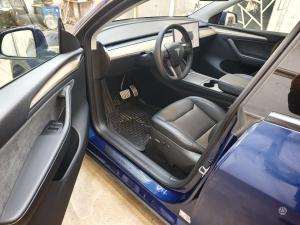 Blue Tesla Model Y 2024 in Tallinn, with an engine capacity of 0.00 L and mileage of 52 thousand km for 37500 €, photo 7 on AUTOMOTO.COM.LV