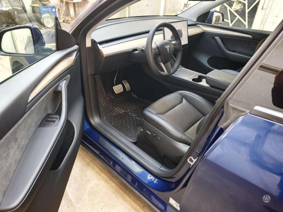 Blue Tesla Model Y 2024 in Tallinn, with an engine capacity of 0.00 L and mileage of 52 thousand km for 37500 €, photo 7 on AUTOMOTO.COM.LV