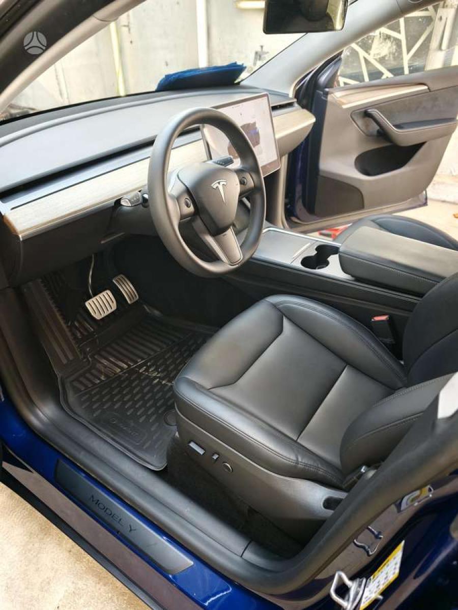 Blue Tesla Model Y 2024 in Tallinn, with an engine capacity of 0.00 L and mileage of 52 thousand km for 37500 €, photo 8 on AUTOMOTO.COM.LV