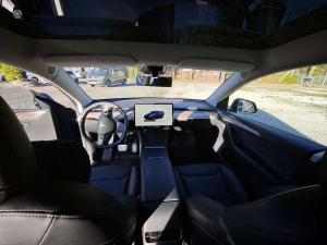 Blue Tesla Model Y 2024 in Tallinn, with an engine capacity of 0.00 L and mileage of 52 thousand km for 37500 €, photo 12 on AUTOMOTO.COM.LV