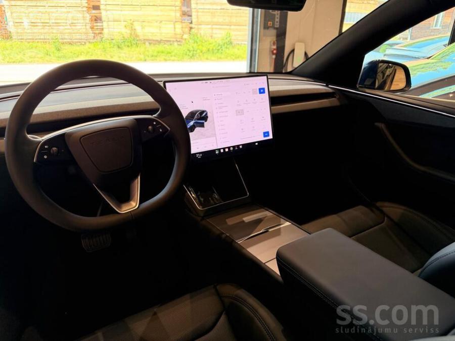 Blue Tesla Model Y 2026 in Riga, with an engine capacity of 0.00 L and mileage of 10 thousand km for 59900 €, photo 8 on AUTOMOTO.COM.LV
