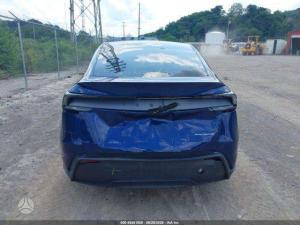 Blue Tesla Model Y 2026 in Klaipeda, with an engine capacity of 0.00 L and mileage of 22 thousand km for 17900 €, photo 6 on AUTOMOTO.COM.LV