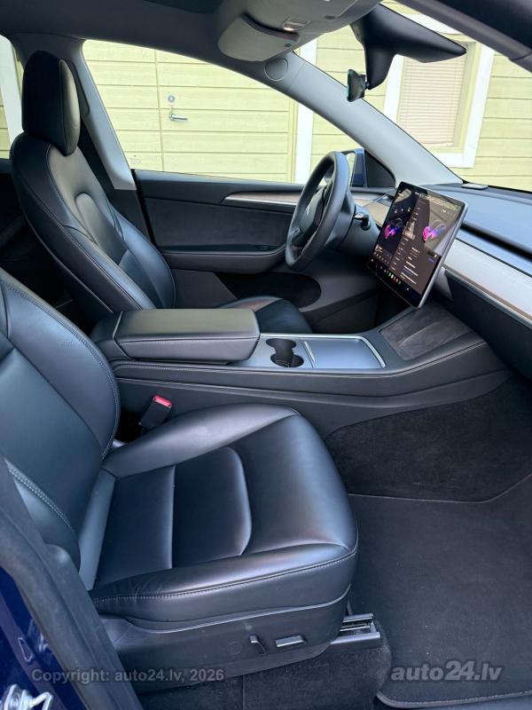 Blue Tesla Model Y 2021 in Tallinn, with an engine capacity of 0.00 L and mileage of 10 thousand km for 32000 €, photo 6 on AUTOMOTO.COM.LV