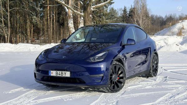 Blue Tesla Model Y 2022 in Kaunas, with an engine capacity of 0.00 L and mileage of 98 thousand km for 25500 €, photo 1 on AUTOMOTO.COM.LV