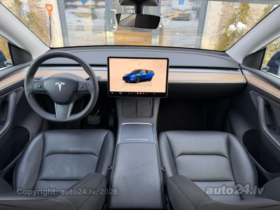 Blue Tesla Model Y 2022 in Tallinn, with an engine capacity of 0.00 L and mileage of 55 thousand km for 33990 €, photo 5 on AUTOMOTO.COM.LV