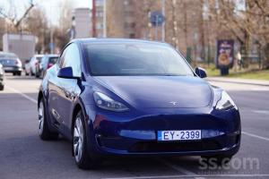 Blue Tesla Model Y 2022 in Riga, with an engine capacity of 0.00 L and mileage of 72 thousand km for 31999 €, photo 5 on AUTOMOTO.COM.LV