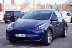 Blue Tesla Model Y 2022 in Riga, with an engine capacity of 0.00 L and mileage of 72 thousand km for 31999 €, photo 6 on AUTOMOTO.COM.LV
